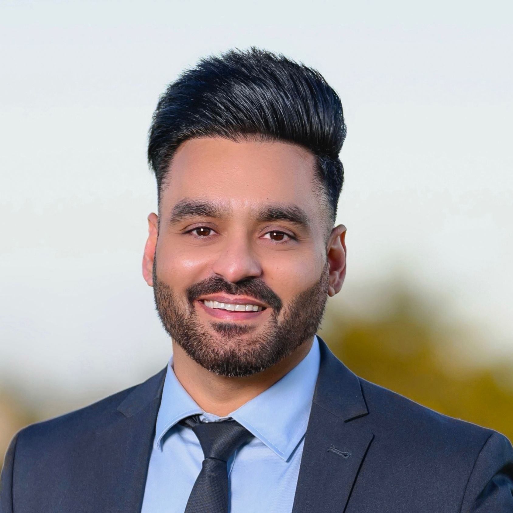 Inder Sandhu • Ray White New Zealand