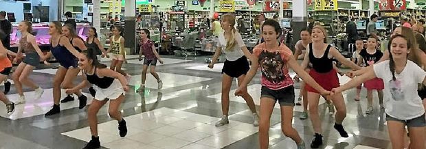 Flash mob surprises shoppers - News - Ray White Whitsunday